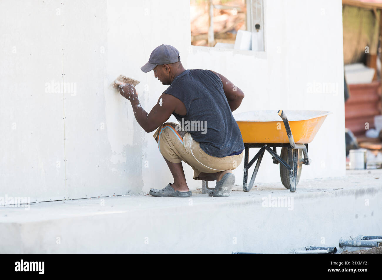 A house construction african at work industry Stock Photo - Alamy
