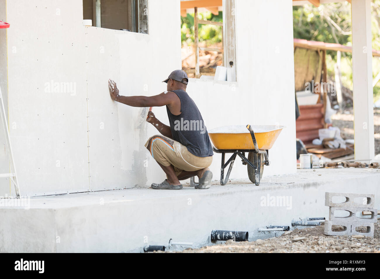 A house construction african at work industry Stock Photo - Alamy