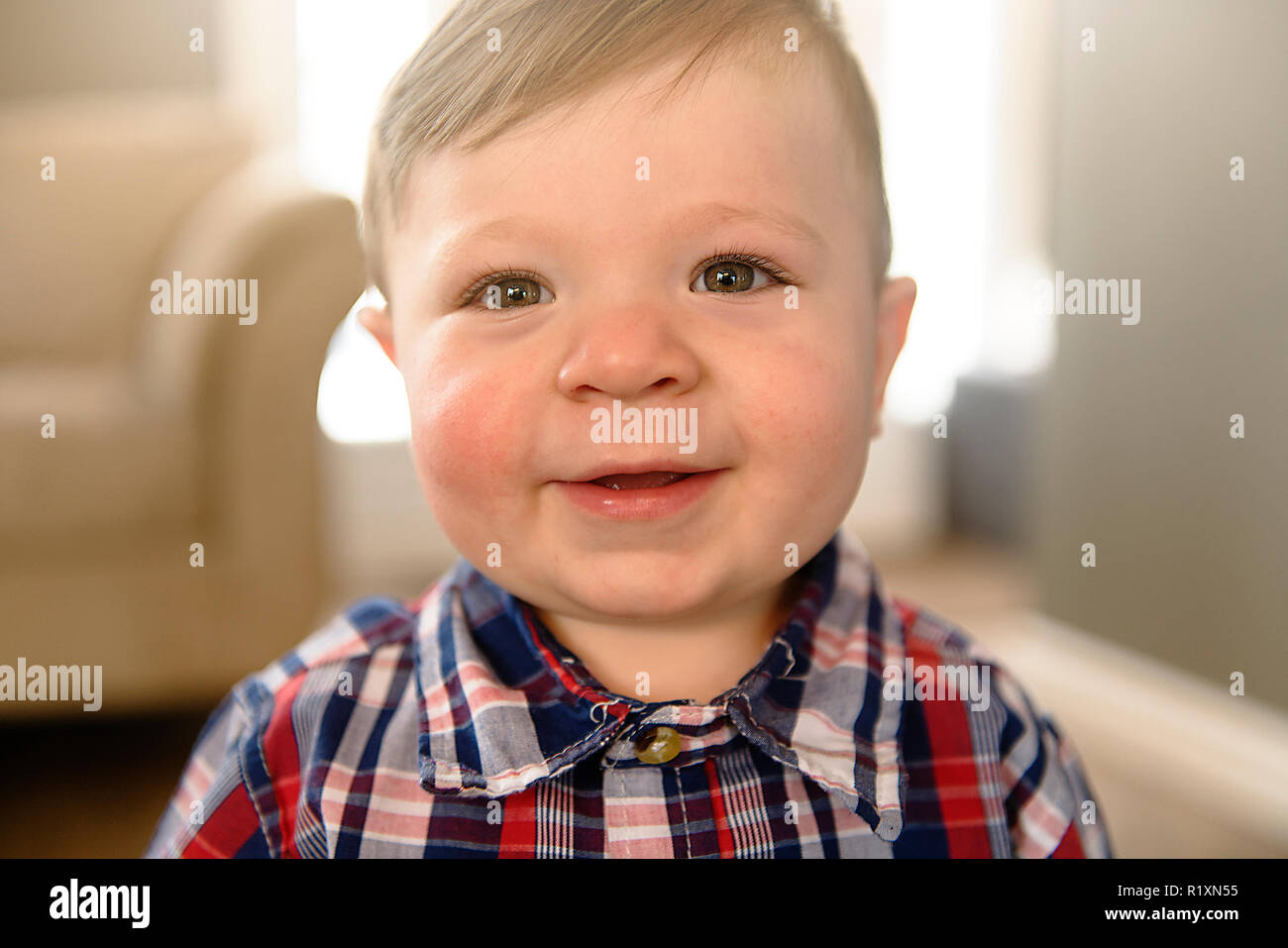 A child boy, standing up in at home Stock Photo - Alamy