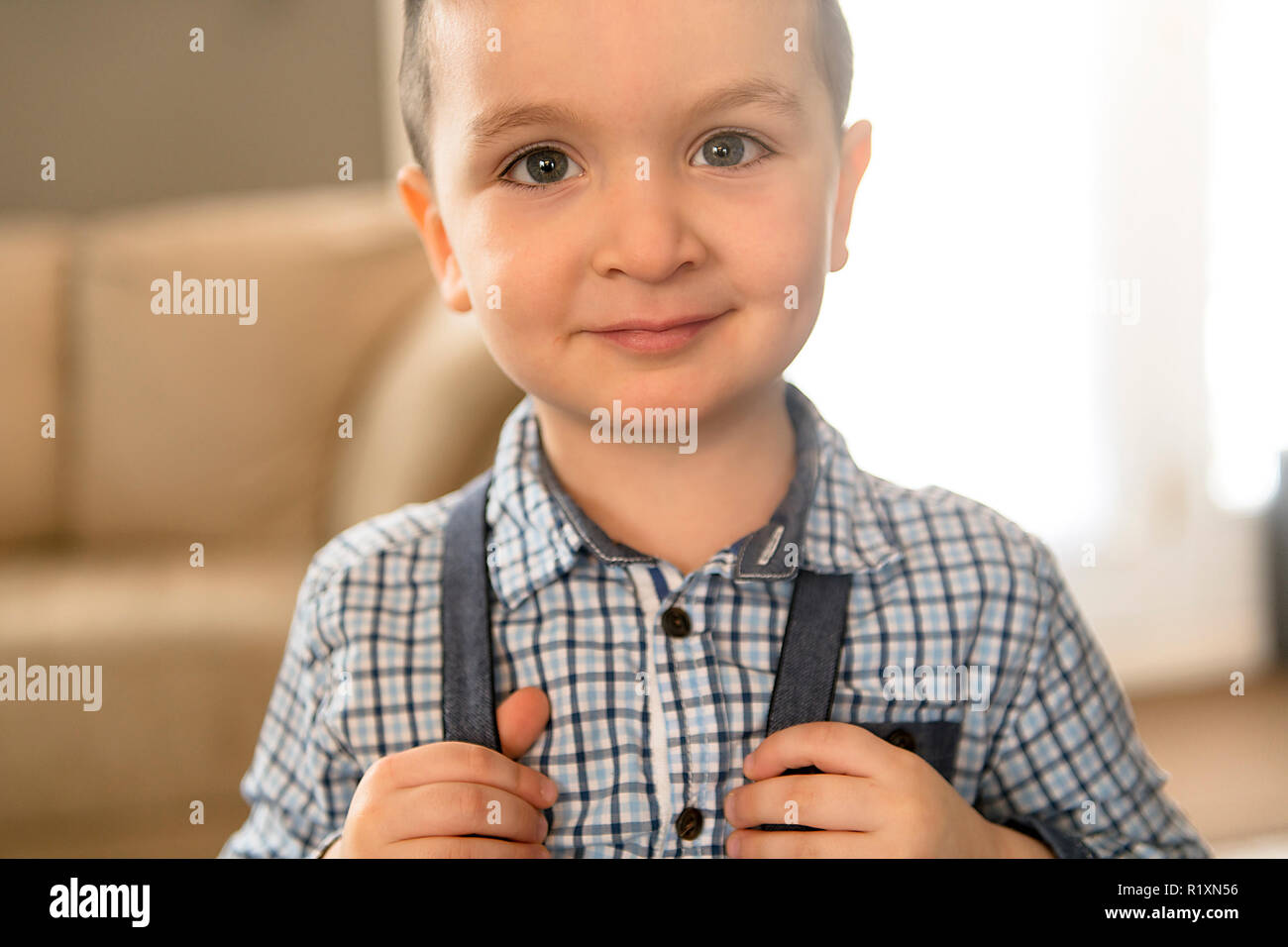 A child boy, standing up in at home Stock Photo - Alamy