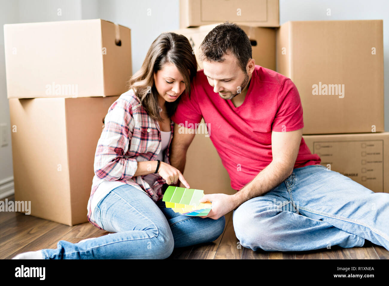 Loving Couple moving from house at day time Stock Photo - Alamy