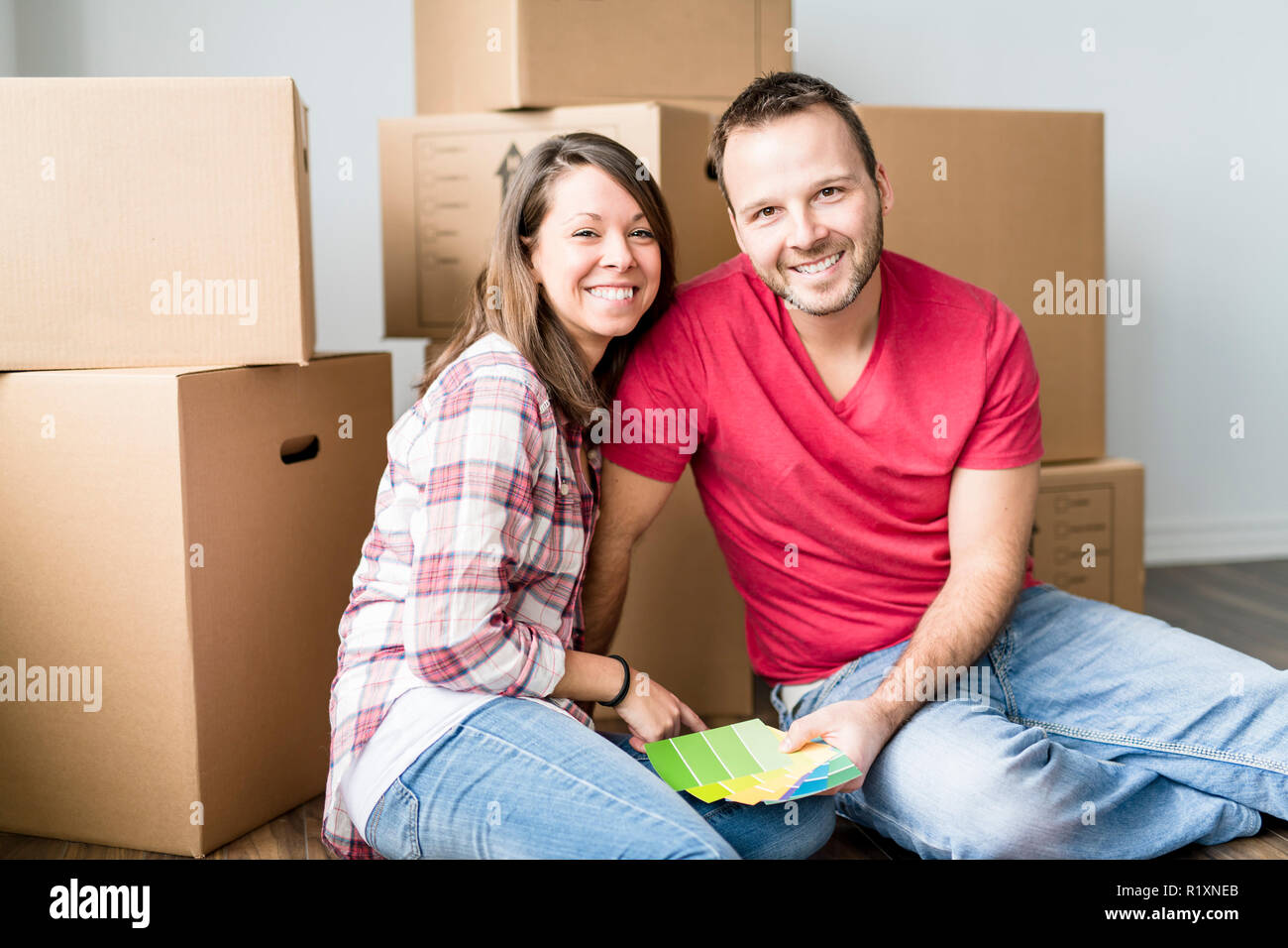 Loving Couple moving from house at day time Stock Photo - Alamy