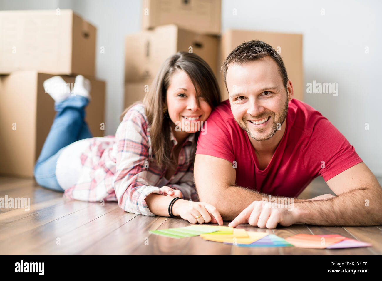 Loving Couple moving from house at day time Stock Photo - Alamy