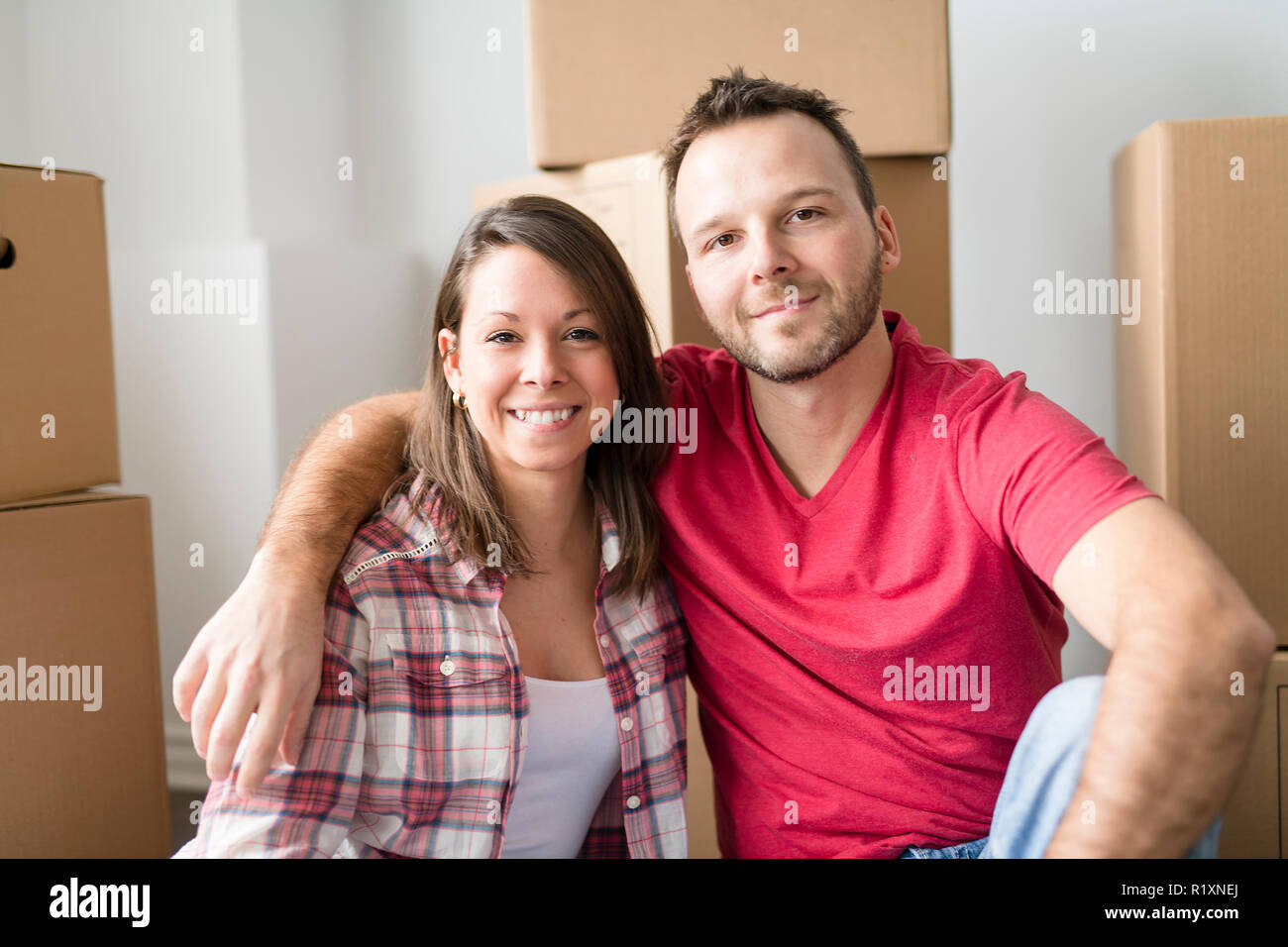 Loving Couple moving from house at day time Stock Photo - Alamy