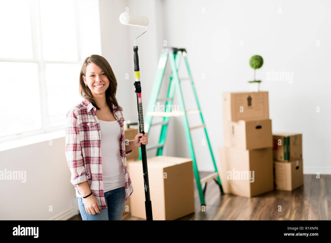 woman moving from house at day time Stock Photo - Alamy
