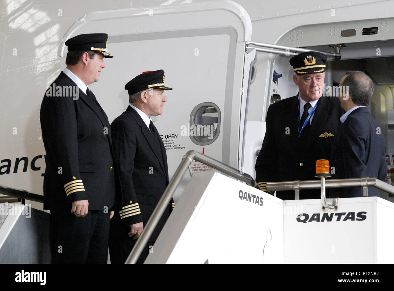 (l-r) Qantas pilot Qantas Peter Probert, Qantas air crew member, Qantas ...