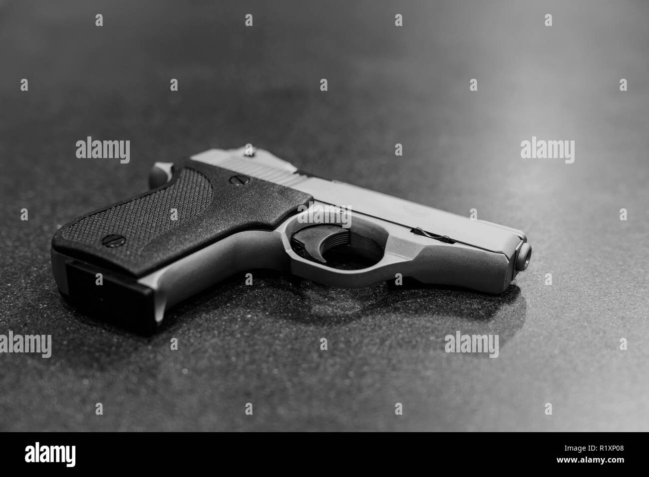 Small handgun Black and White Stock Photos & Images - Alamy