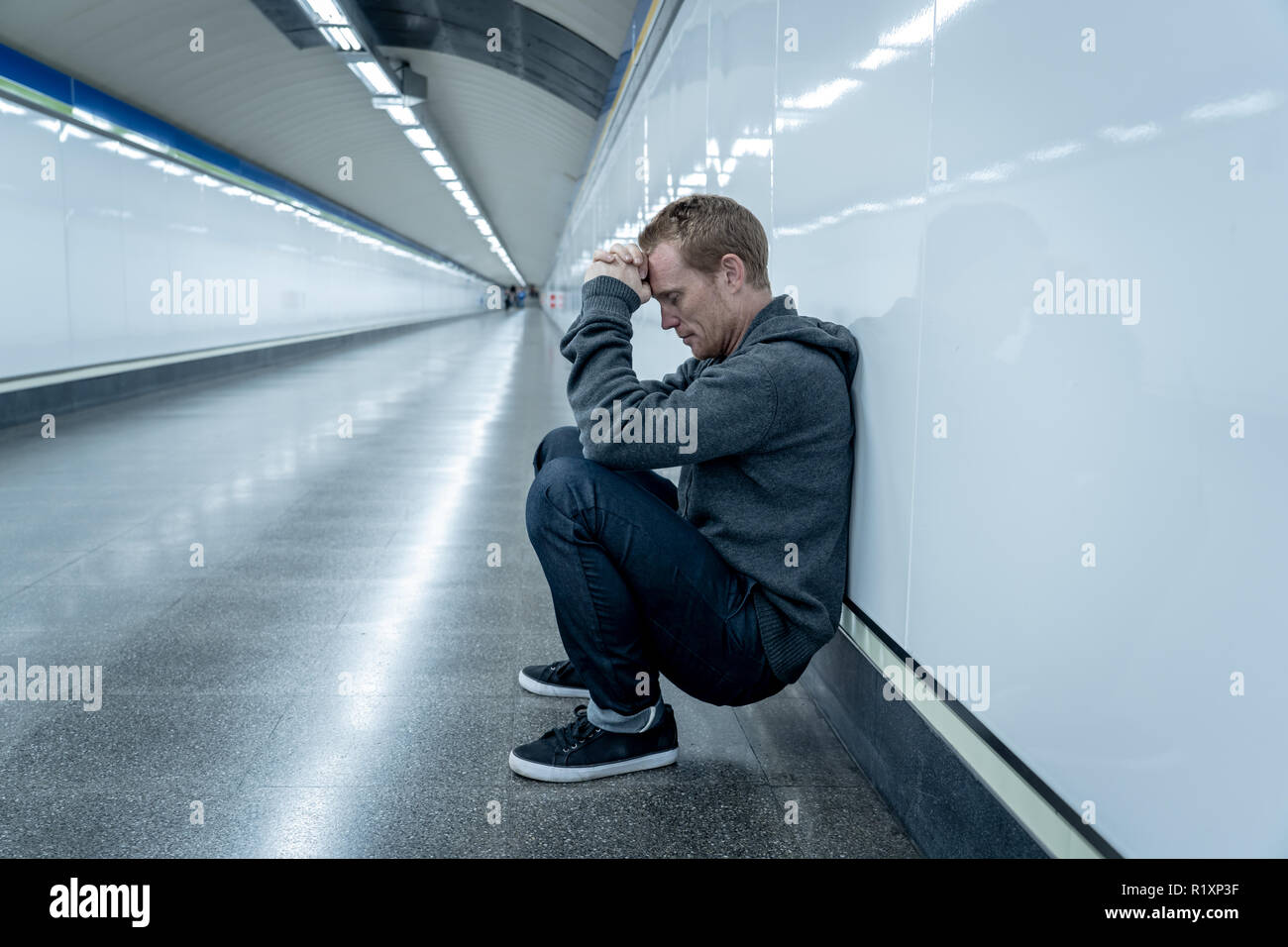 Miserable jobless young man crying Drug addict Homeless in depression ...