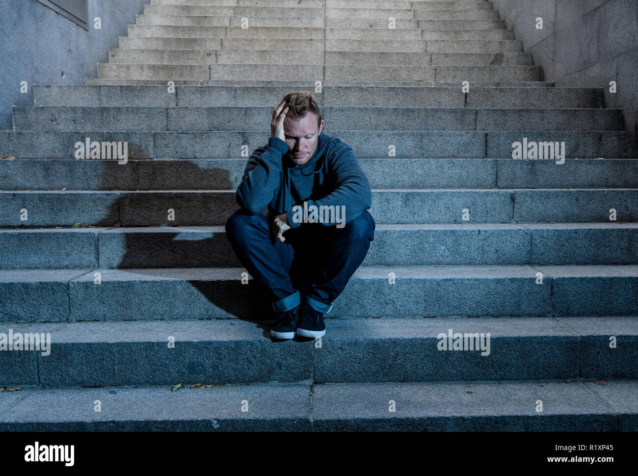 Young desperate jobless man in casual clothes abandoned lost in ...