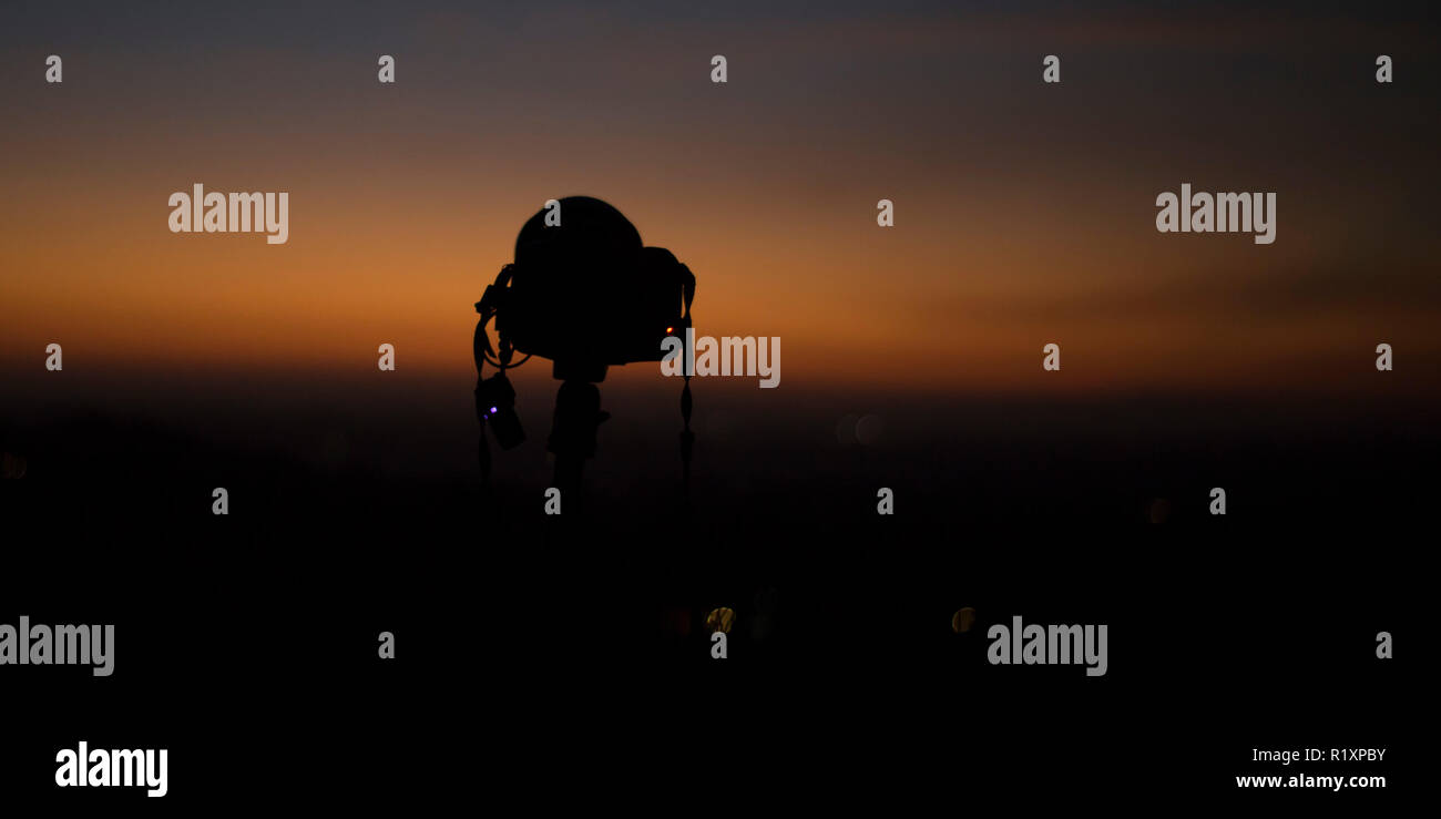 Silhouetted photographer at work hi-res stock photography and images ...