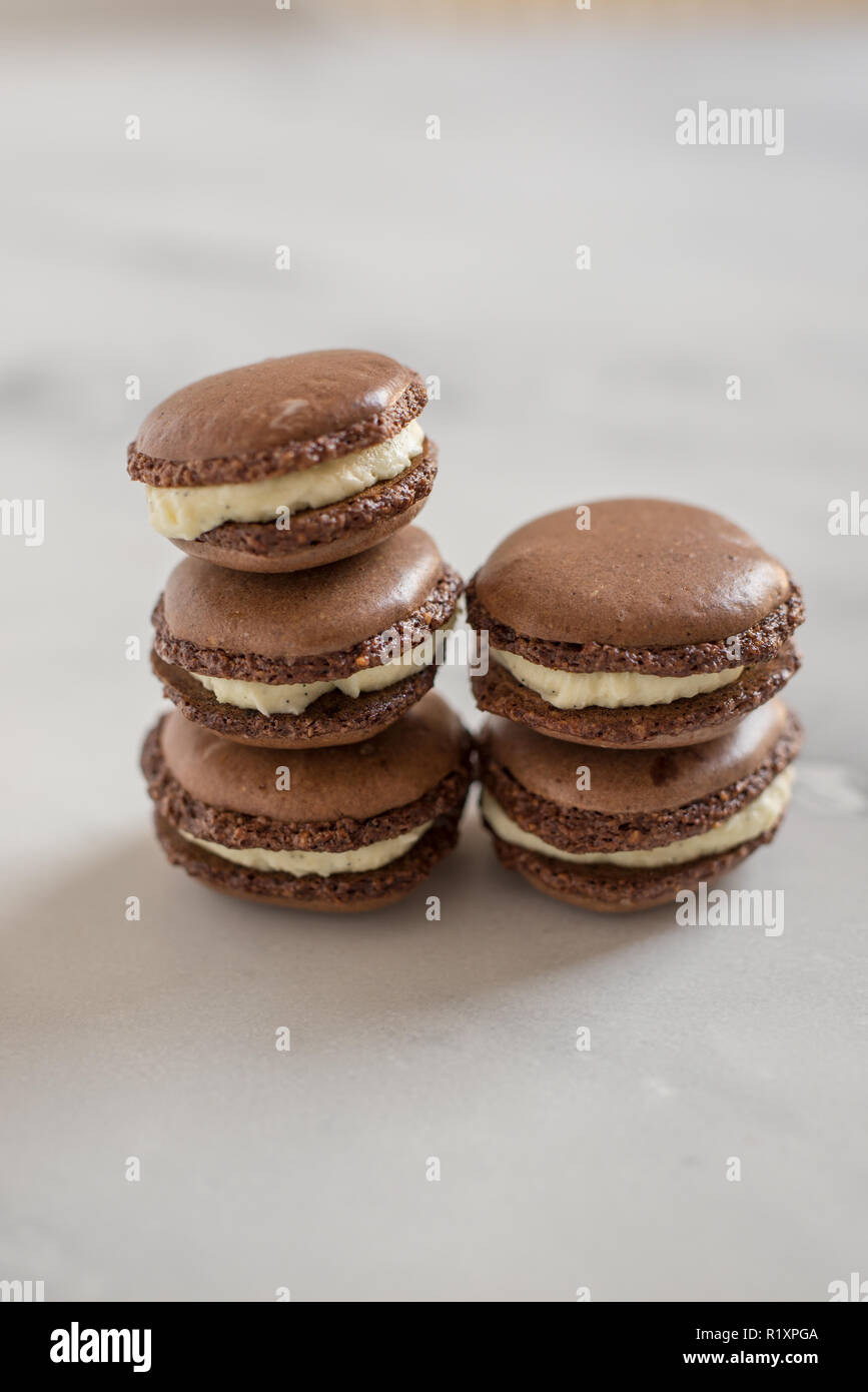 chocolate macarons with vanilla cream Stock Photo - Alamy