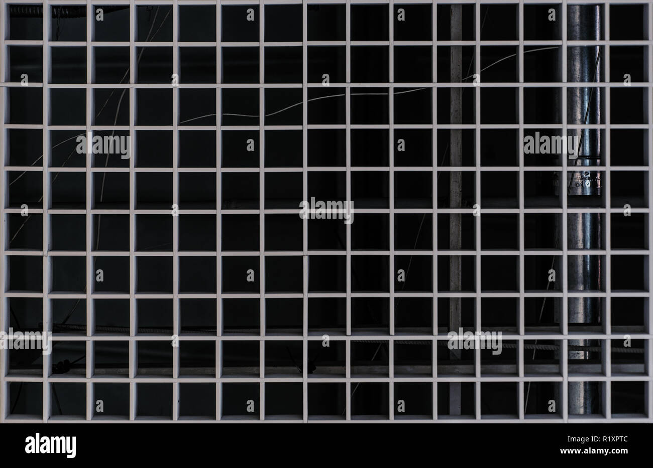 Grid structure of suspended ceiling in an mall building. Abstract ...