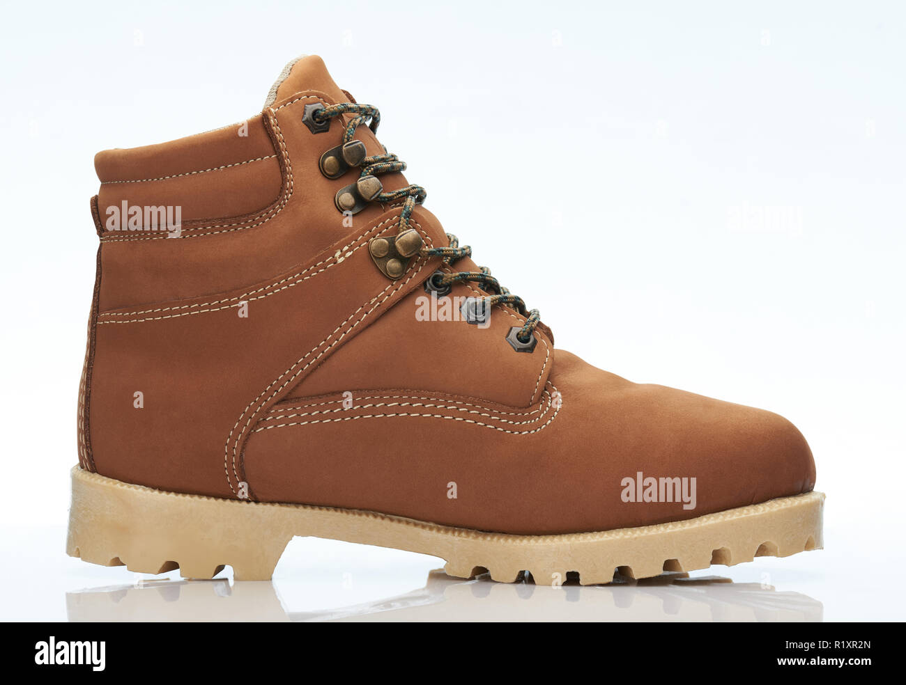 Brown leather hiking shoe side view isolated on white background Stock ...
