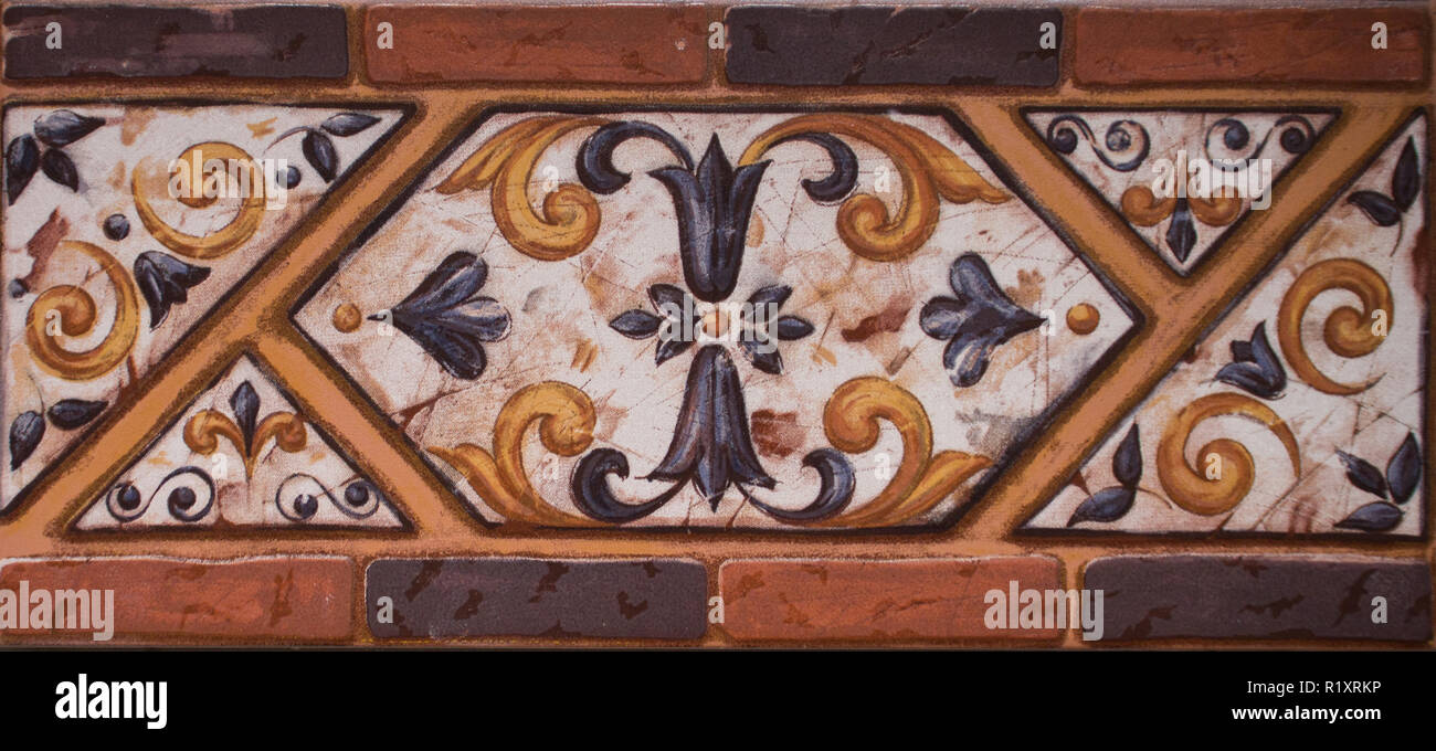 Detail of the traditional tiles from facade of old house. Decorative ...