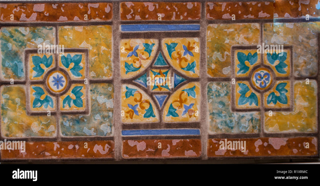 Detail of the traditional tiles from facade of old house. Decorative ...