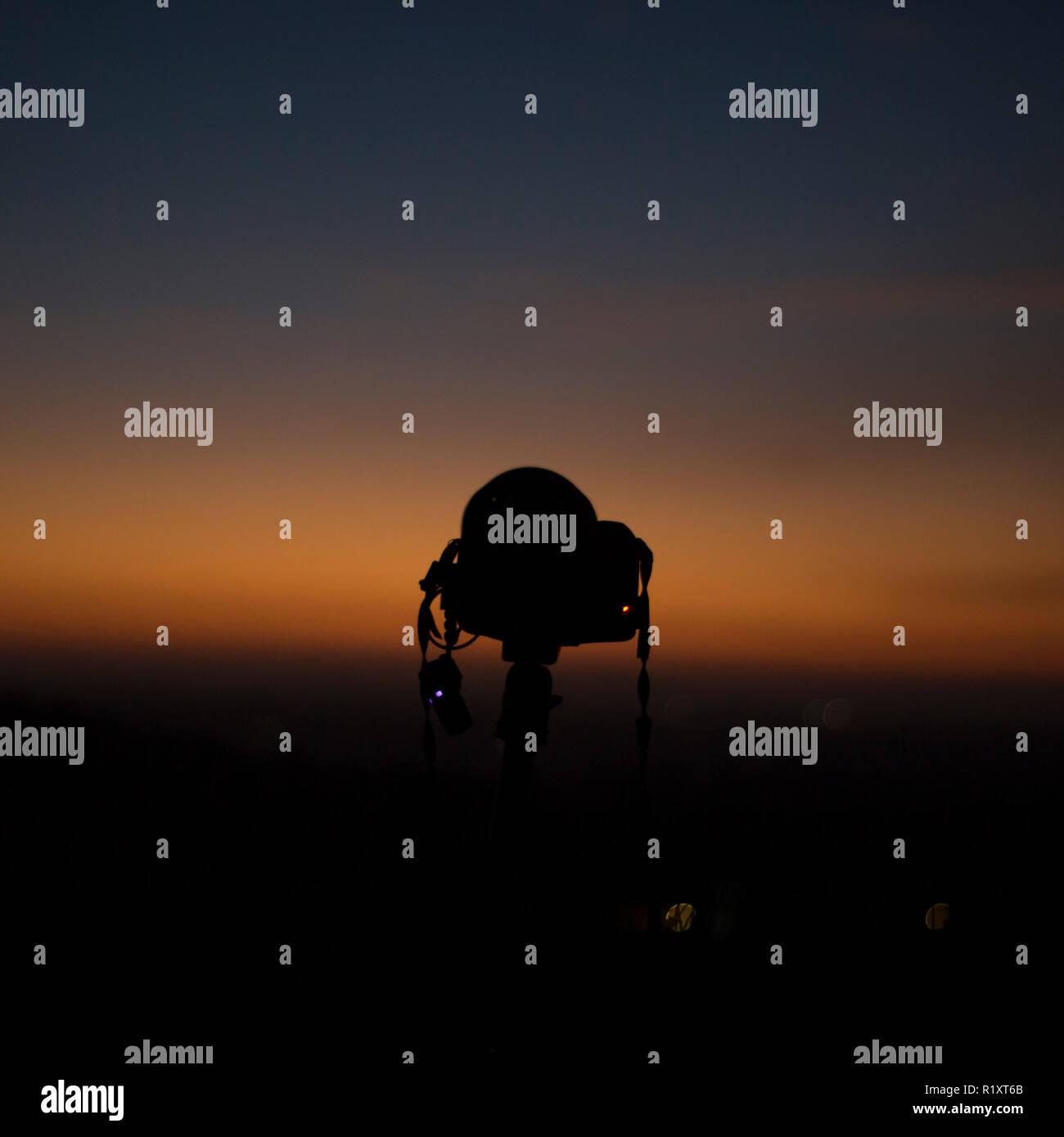 Silhouetted tripod hi-res stock photography and images - Alamy