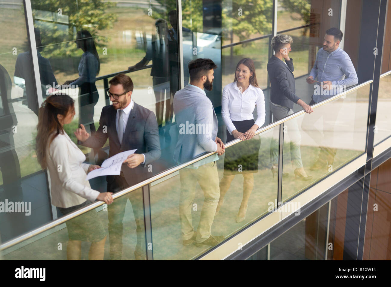 Young businesswoman walking documents hi-res stock photography and ...