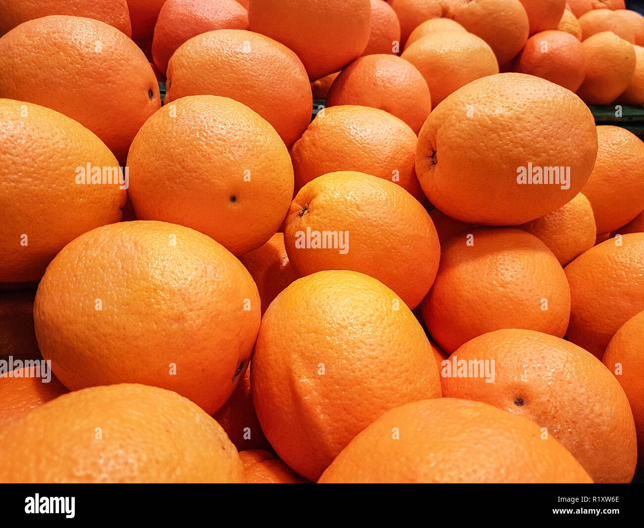 Close-up of a fresh orange fruits for sale as an agricultural ...
