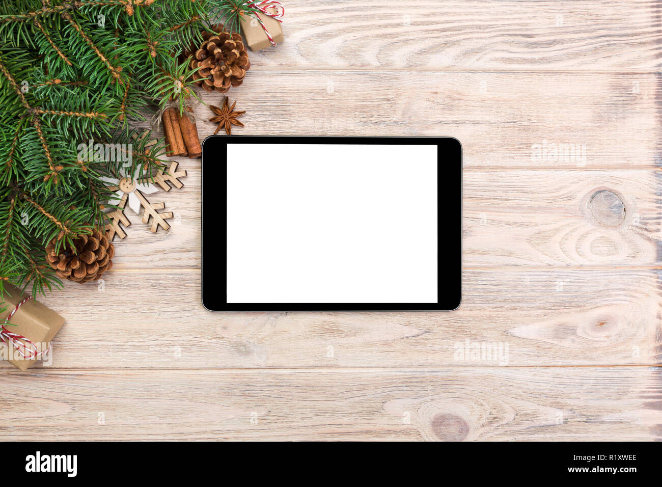 Digital tablet mock up with rustic Christmas wood background ...