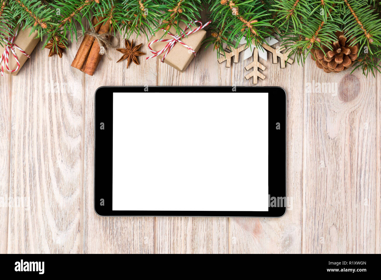 Digital tablet mock up with rustic Christmas wood background ...