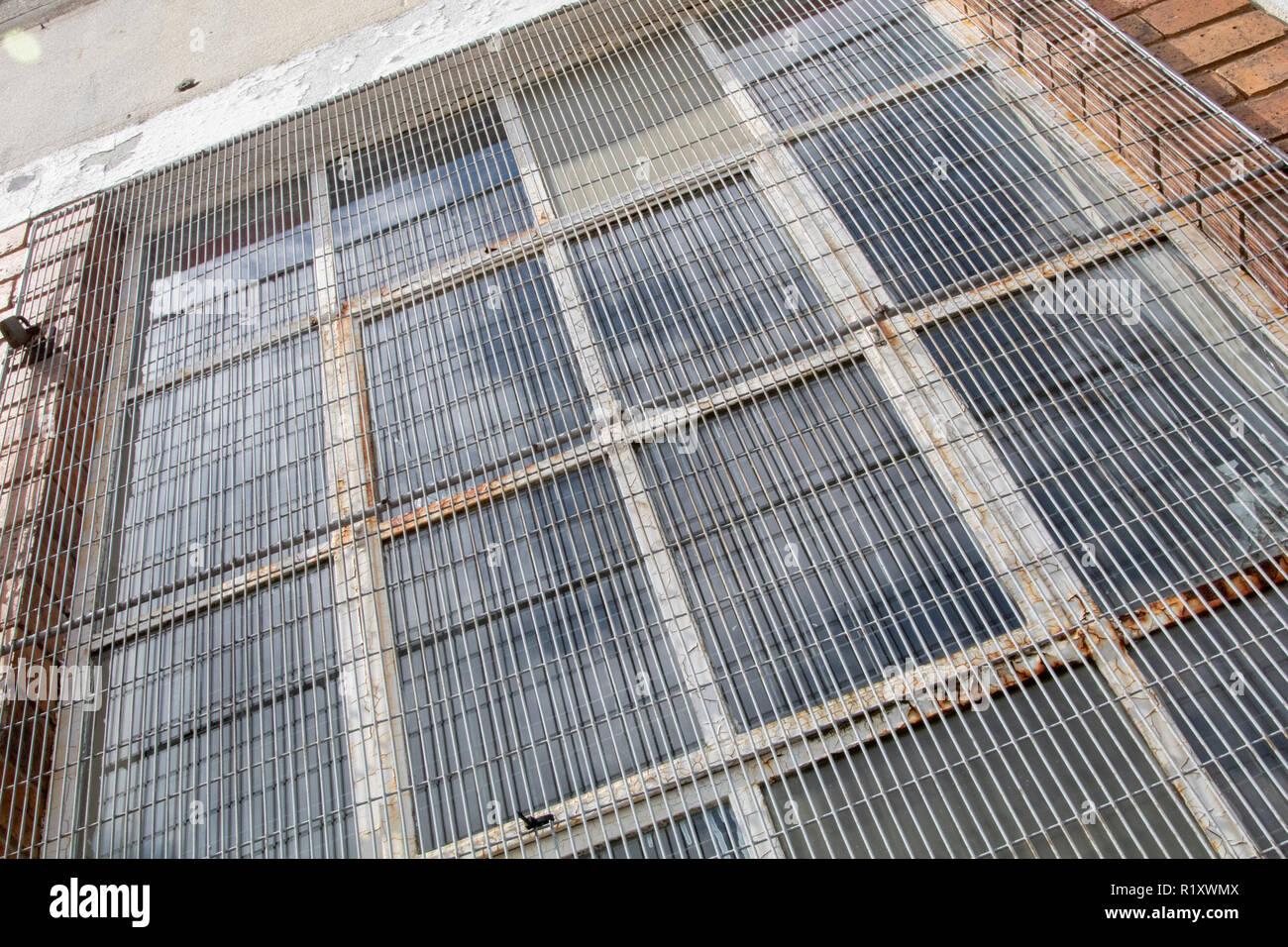 Byker/UK - June 11th 2018: Locked up. Caged windows Stock Photo - Alamy