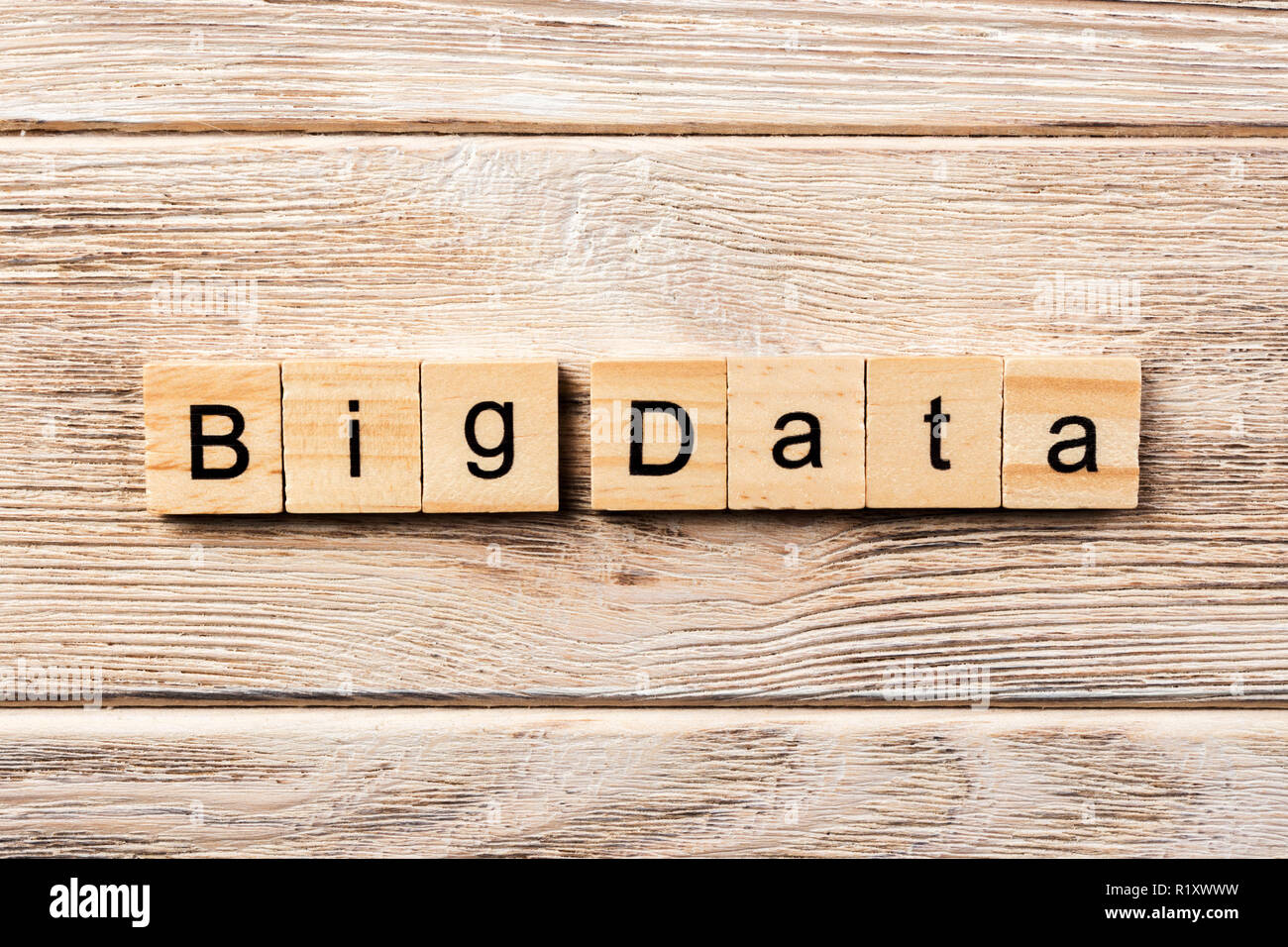 big data word written on wood block. big data text on table, concept ...