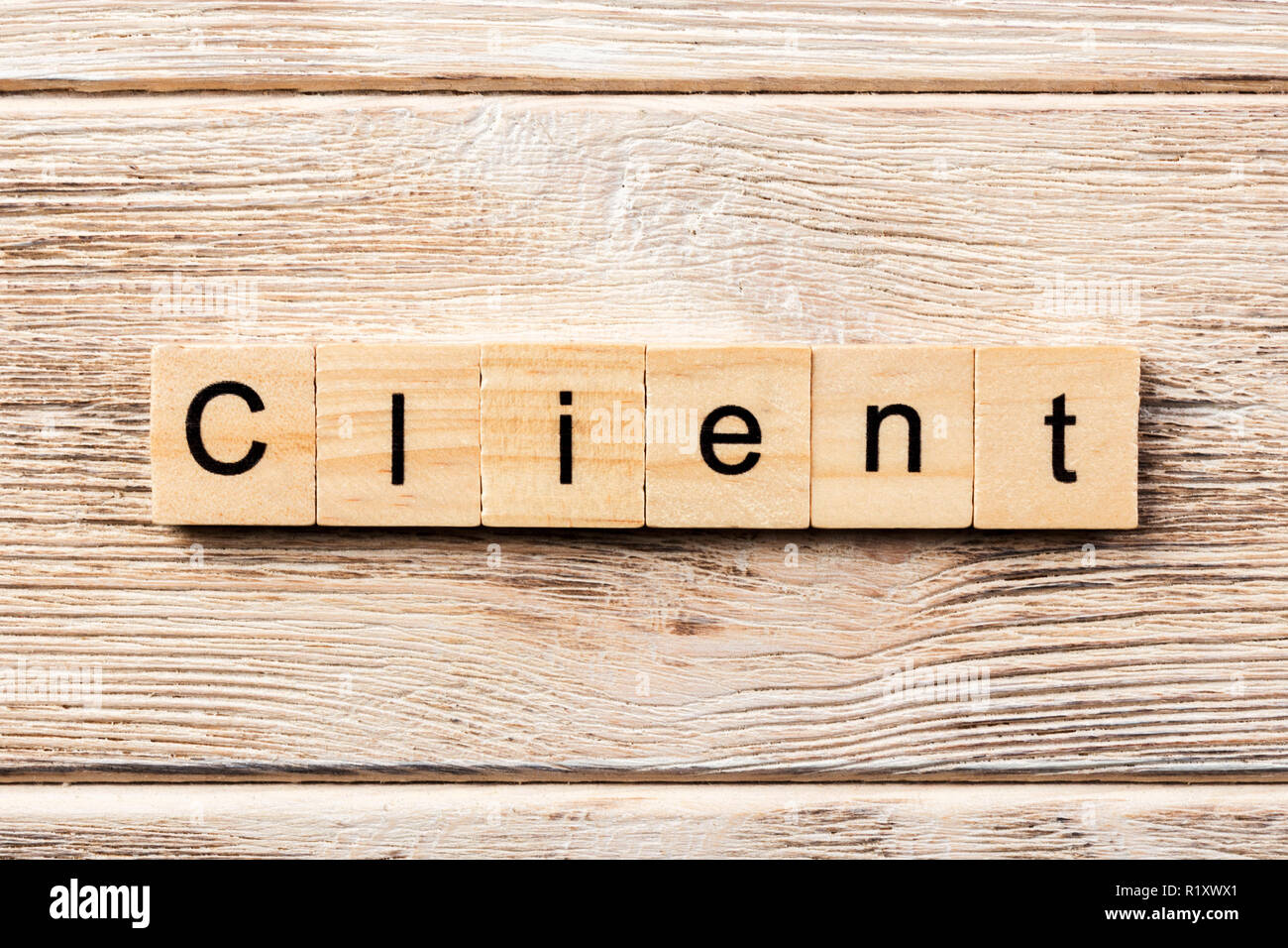 client word written on wood block. client text on table, concept Stock ...