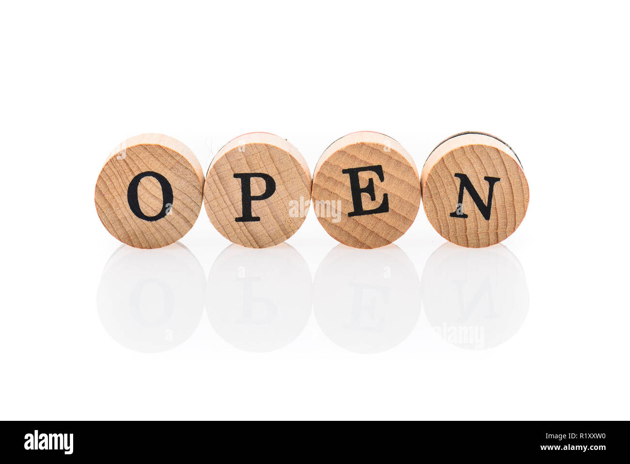Word Open from circular wooden tiles with letters children toy. Concept ...