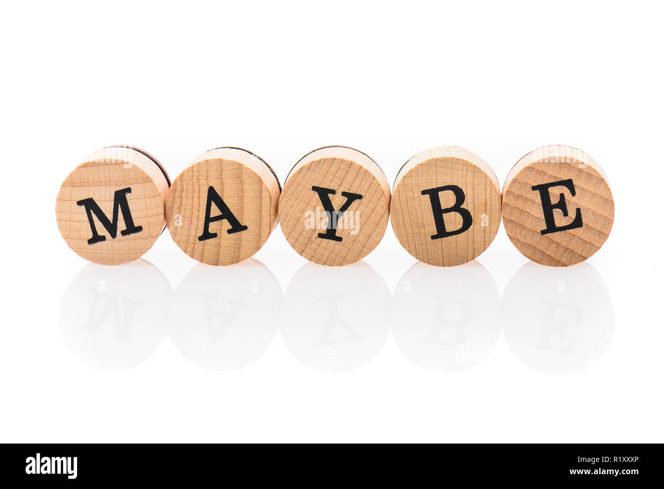 Word Maybe from circular wooden tiles with letters children toy ...