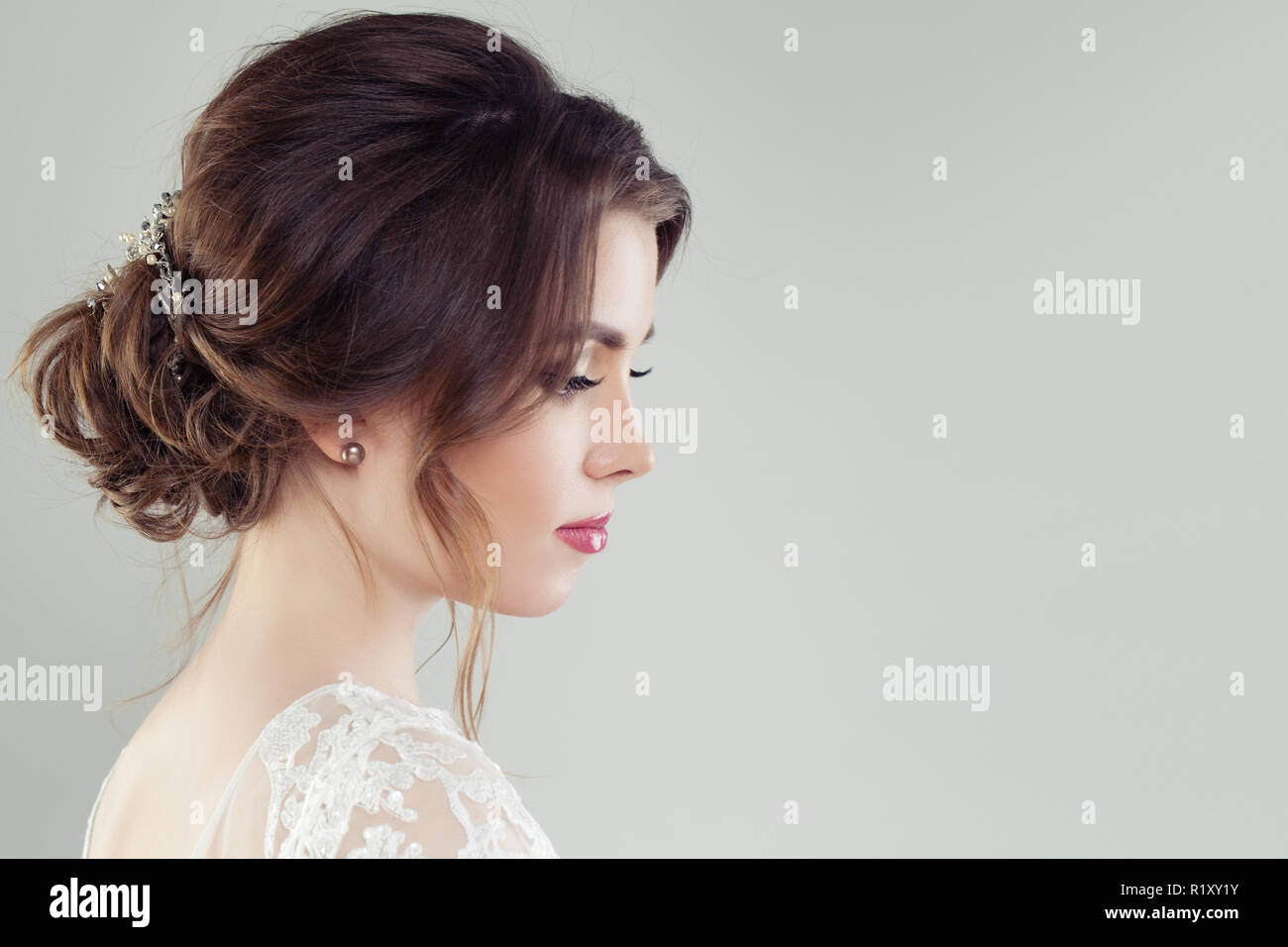 Charming woman with bridal hairstyle and hairdeco, portrait Stock Photo ...