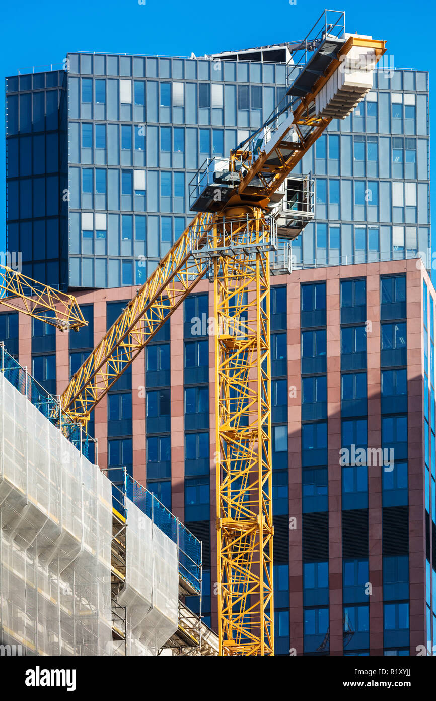 crane is used in the construction of buildings Stock Photo - Alamy