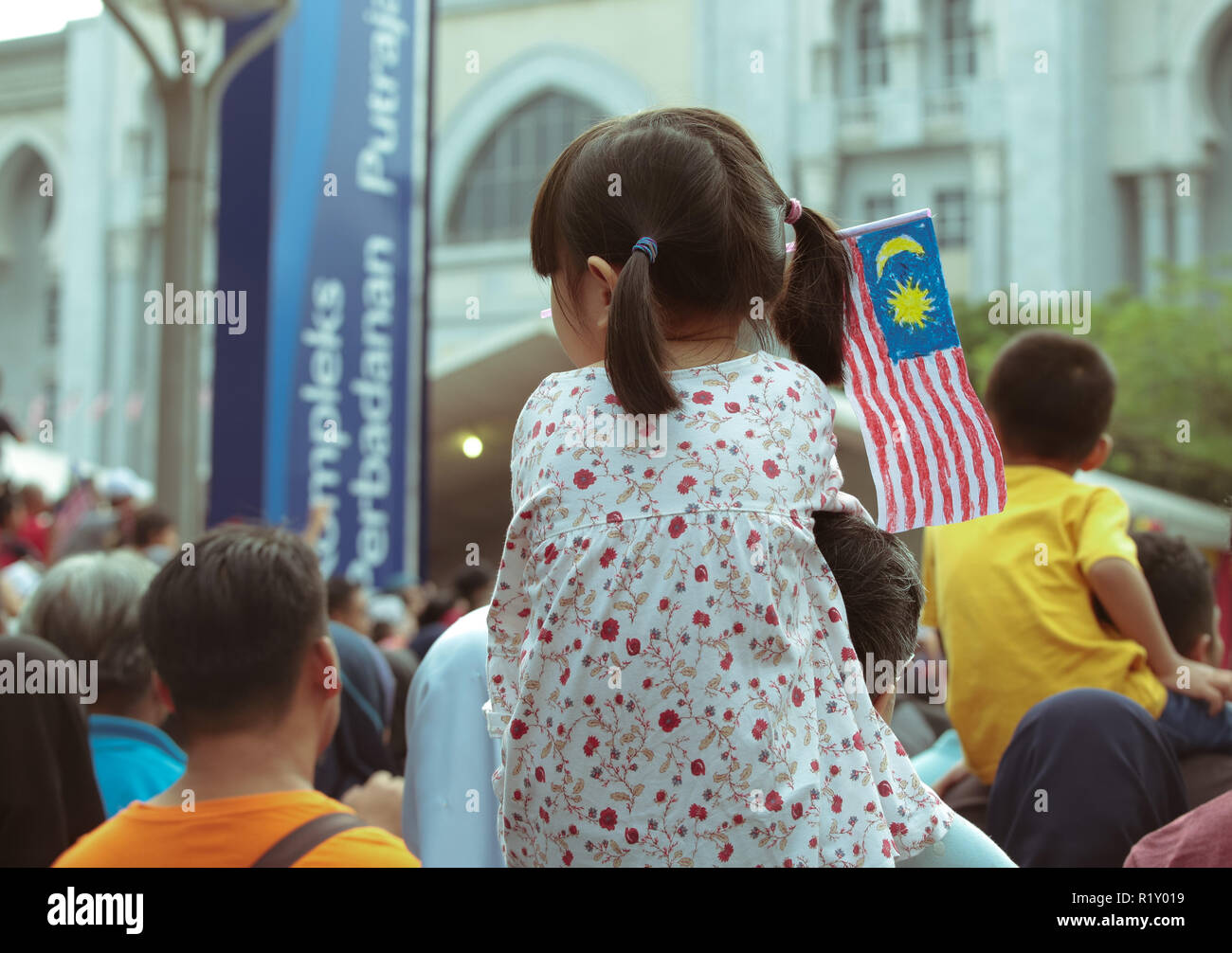 Children shoulder ride their father at Putrajaya during Malaysia ...