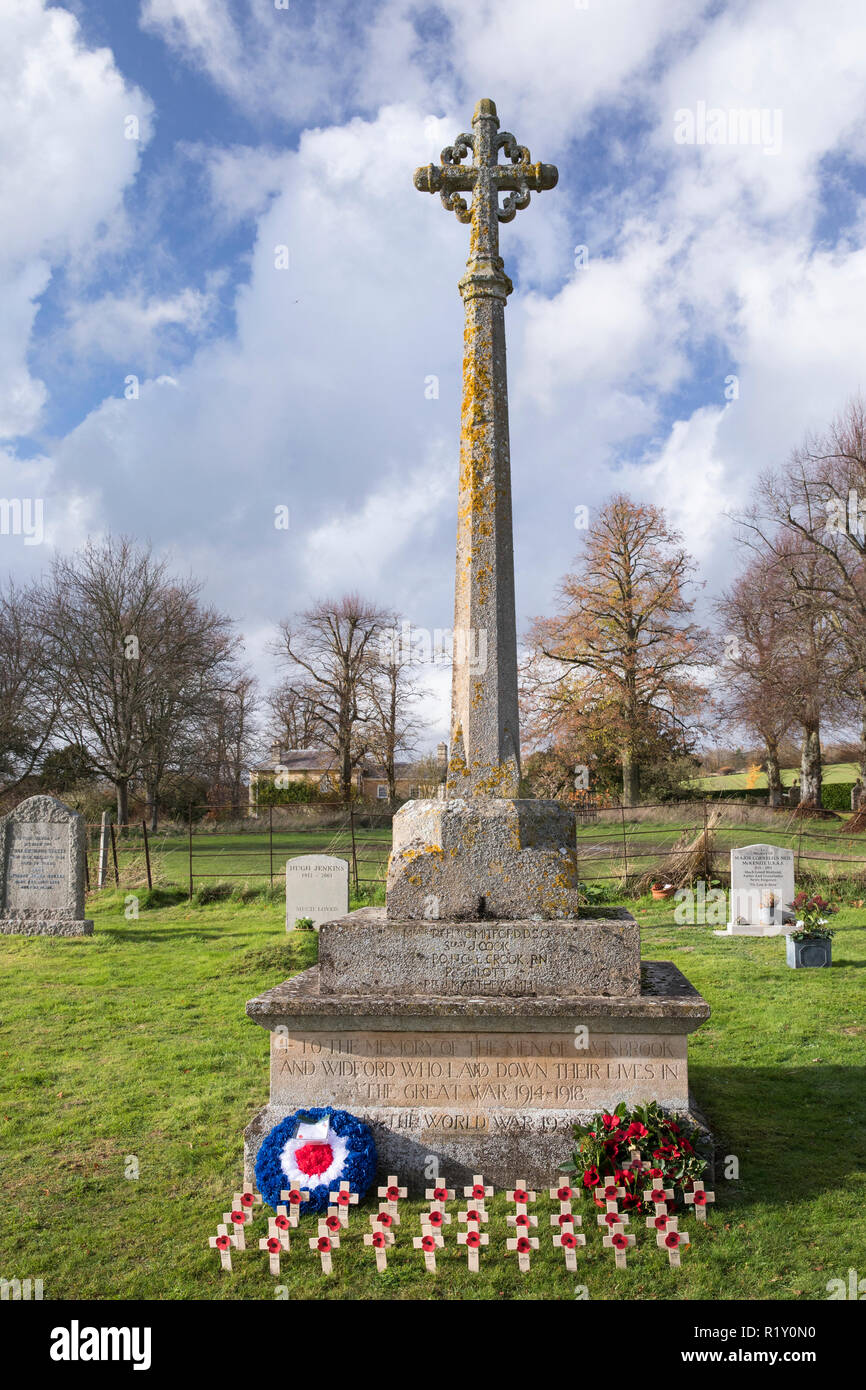 Remembrance wreath and crosses with poppies at war memorial for The ...