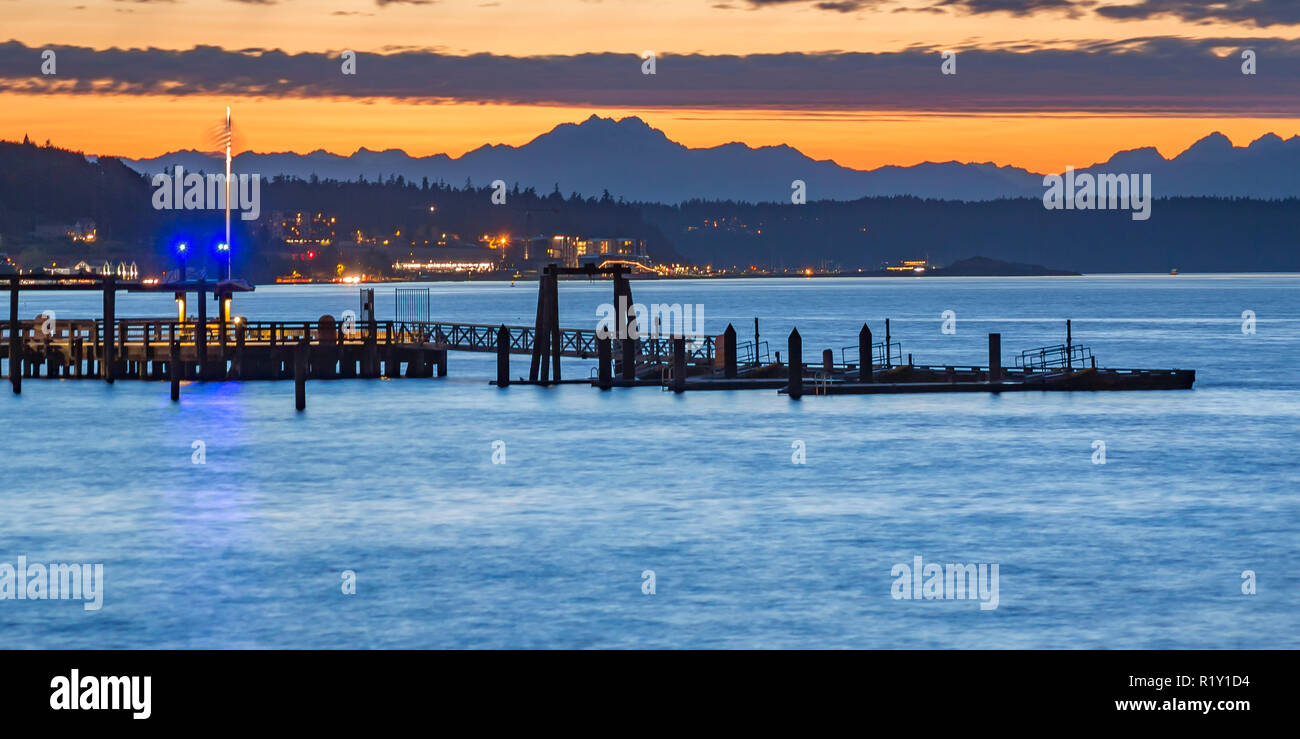Tacoma pier overlookig golden sky at sunset Stock Photo - Alamy