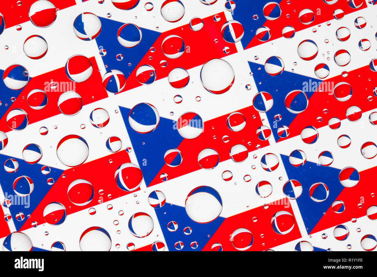 Flags of Czech Republic, behind a glass covered with rain drops.Pattern ...
