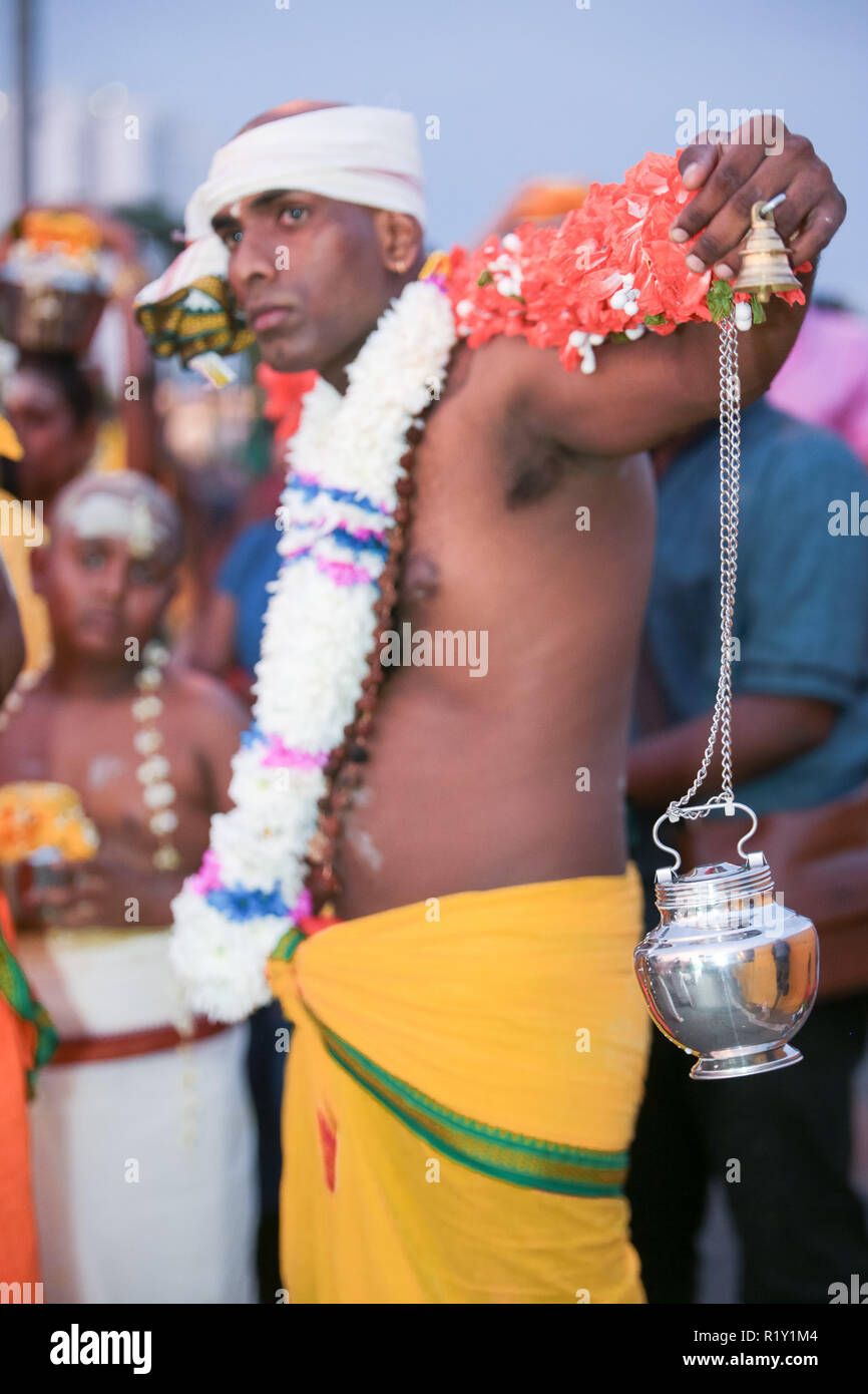 BATU CAVE, MALAYSIA - 31 JAN 2018 : Devotees carrying paal kudam kavadi ...