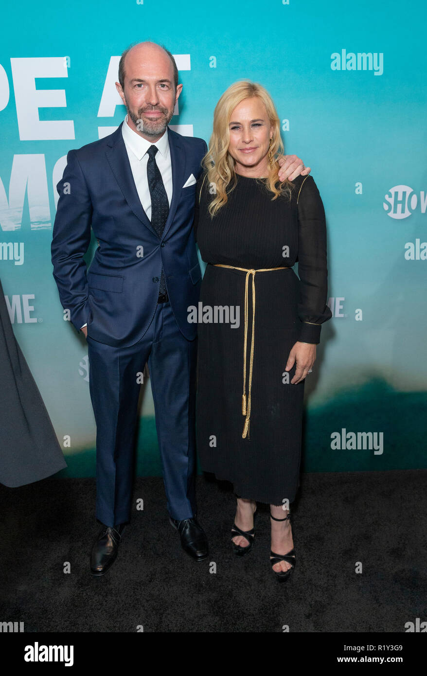 New York, USA - November 14, 2018: Eric Lange and Patricia Arquette ...