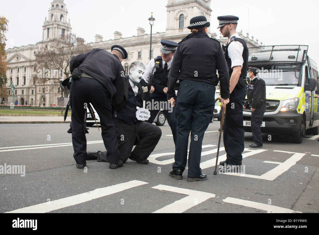 London, UK. 15th Nov, 2018. A climate-change activist, dressed as the ...
