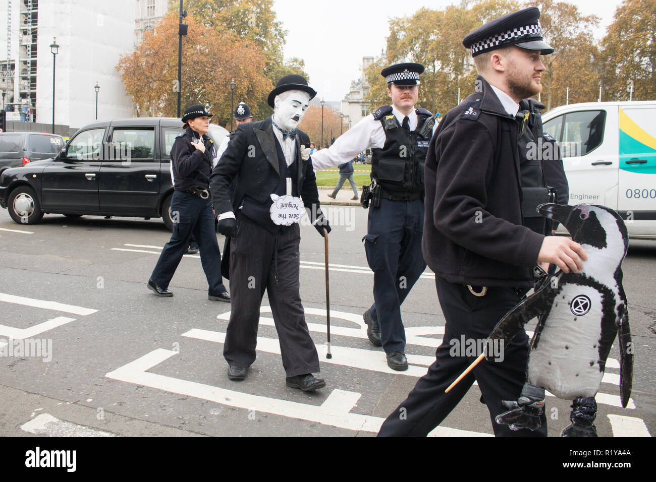 London, UK. 15th Nov, 2018. A climate-change activist, dressed as the ...