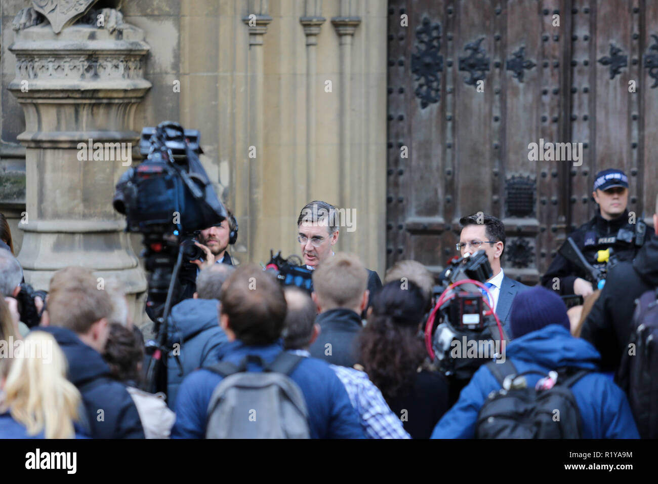 London, UK.15th Nov, 2018. Jacob William Rees-Mogg MP is surrounded by ...