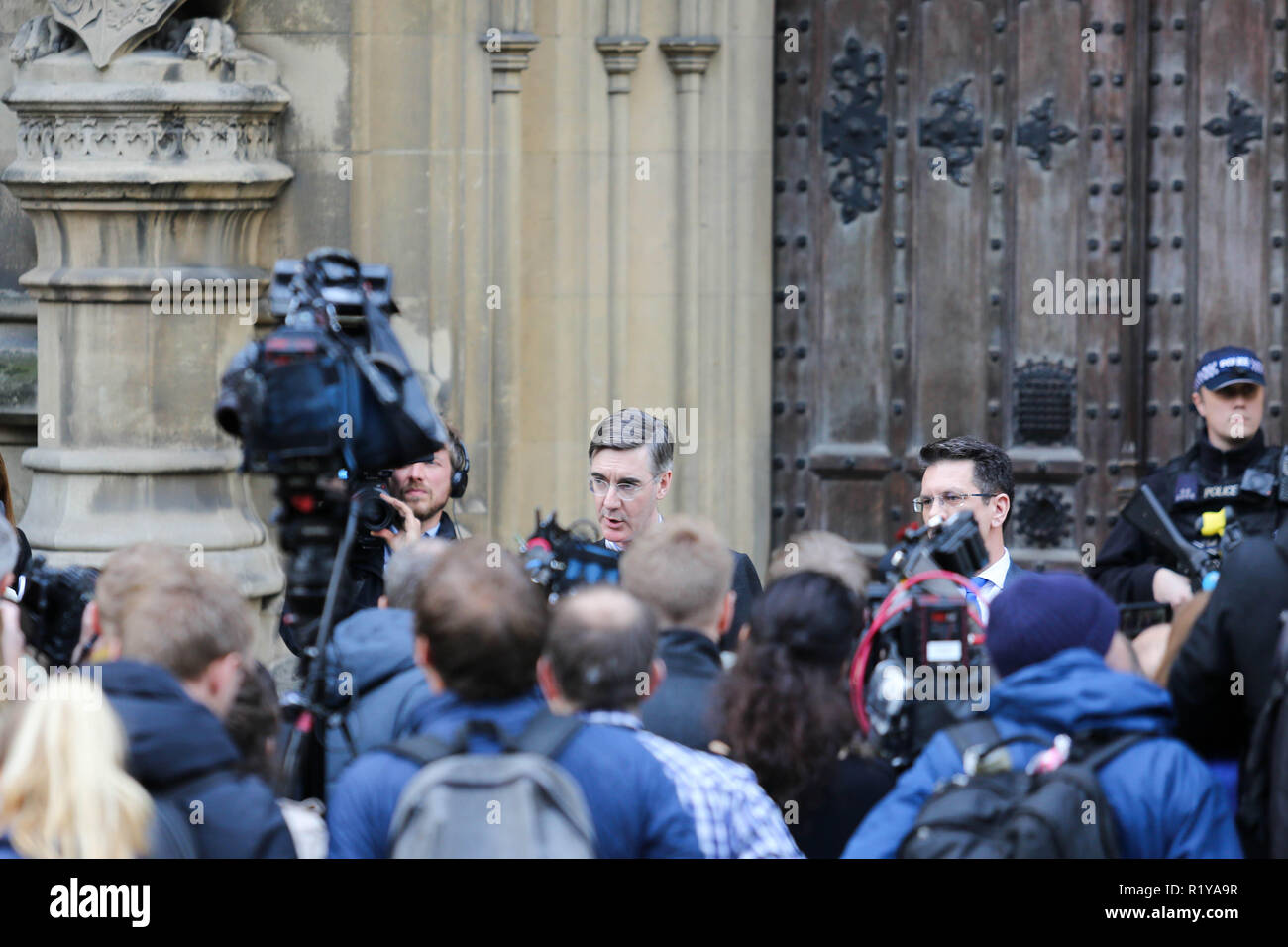 London, UK.15th Nov, 2018. Jacob William Rees-Mogg MP is surrounded by ...