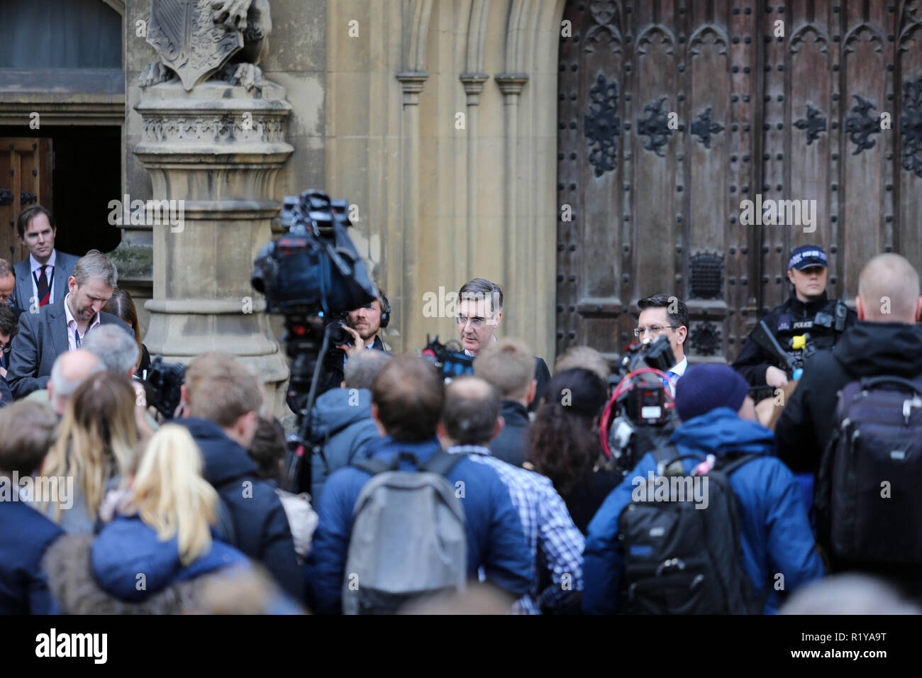 London, UK.15th Nov, 2018. Jacob William Rees-Mogg MP is surrounded by ...