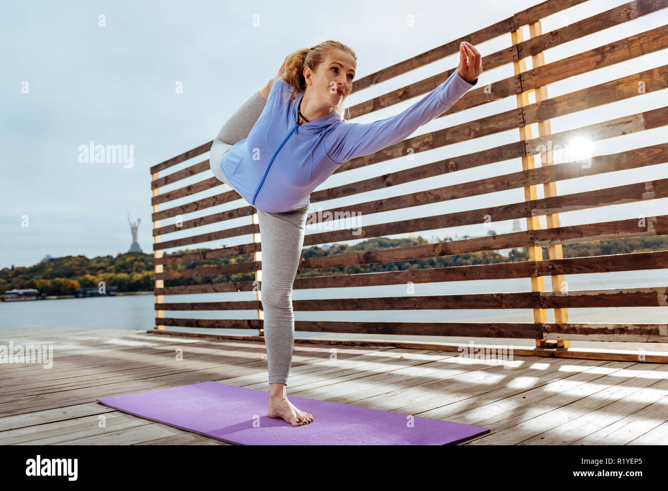 Female yogi balancing on the one leg while doing asanas Stock Photo - Alamy
