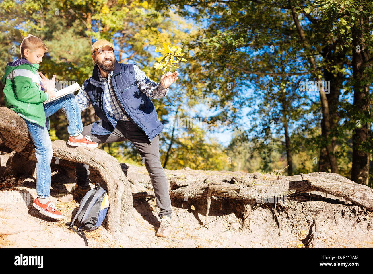 Boy taking notes hi-res stock photography and images - Alamy