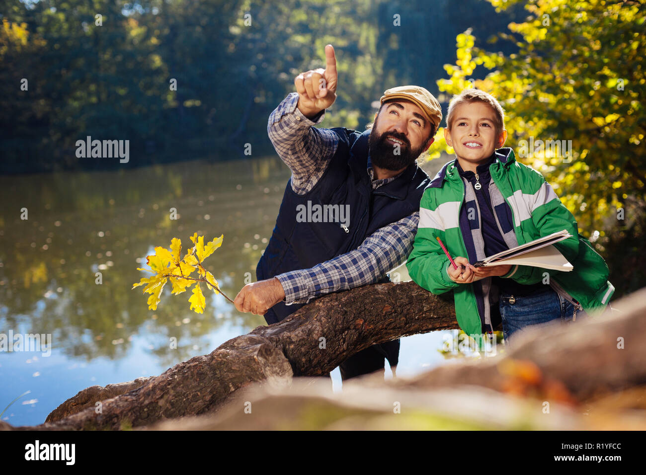 Boy pointing bird hi-res stock photography and images - Alamy