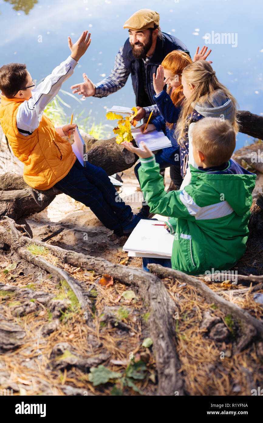 Participating in class hi-res stock photography and images - Alamy