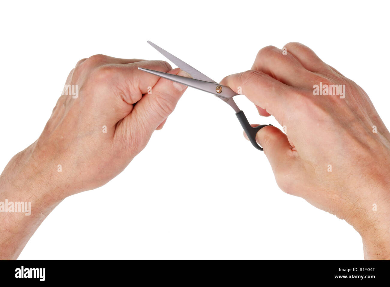 Elderly man cuts old finger nails with steel scissors. Isolated on ...