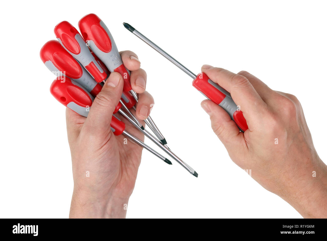 Elderly male home craftsman selects the necessary mass production ...