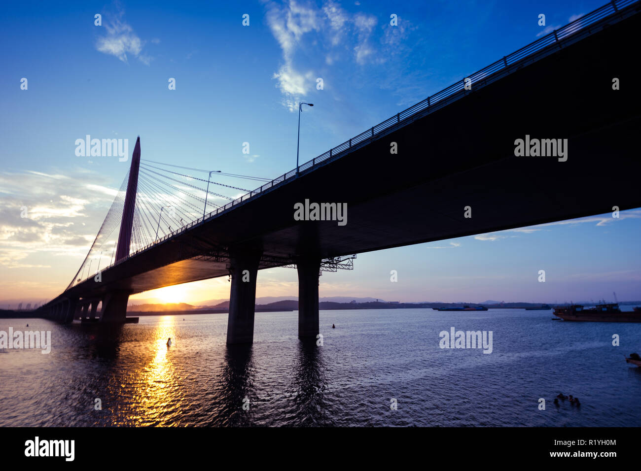 Sunset silhouette Bridge Stock Photo - Alamy