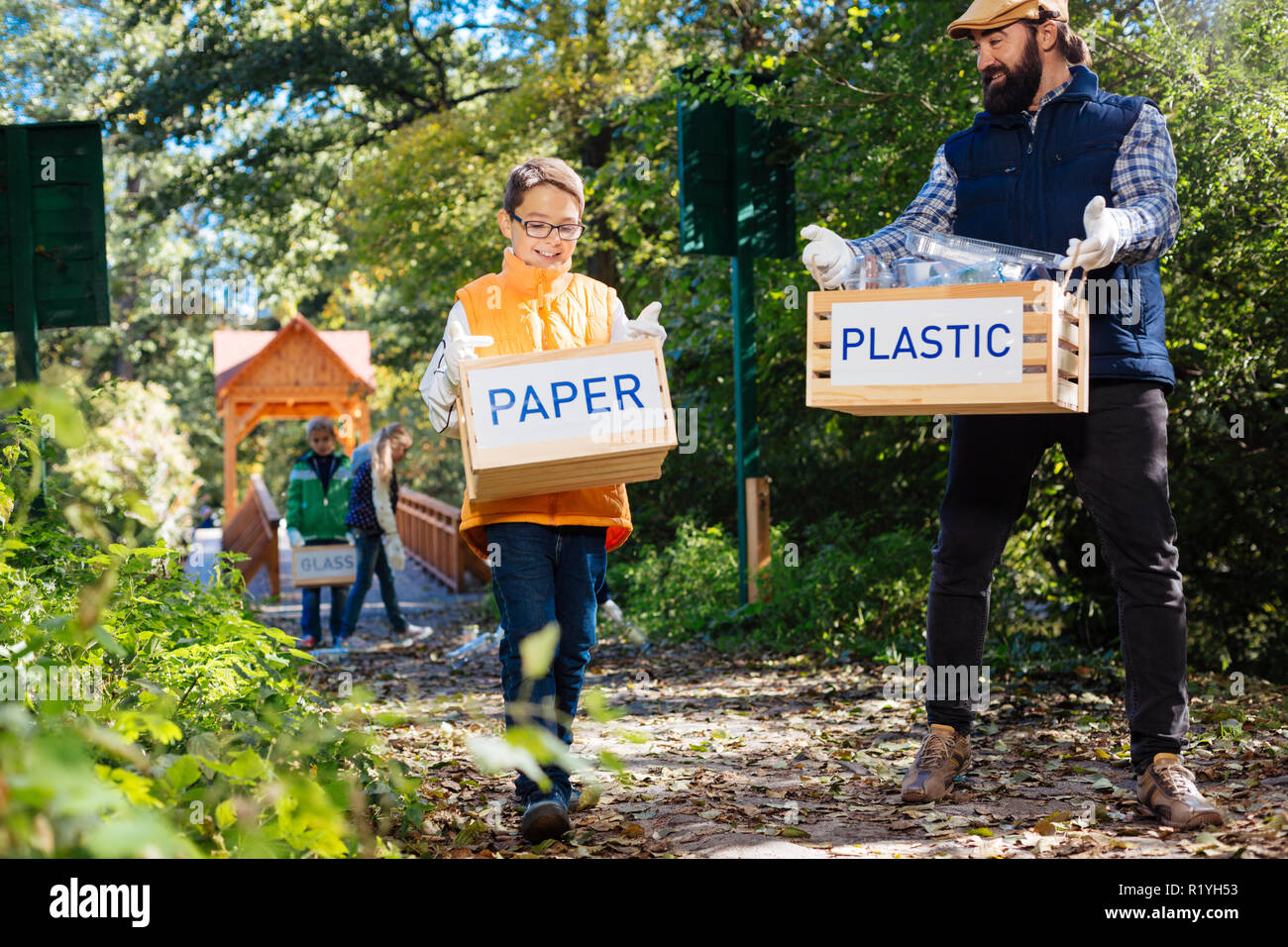 Boy holding a box hi-res stock photography and images - Alamy